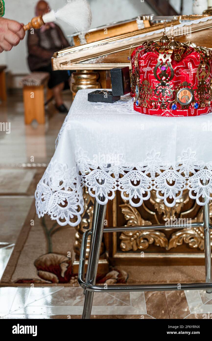 Traditional wedding crowns in a church. Wedding crown in church ready ...