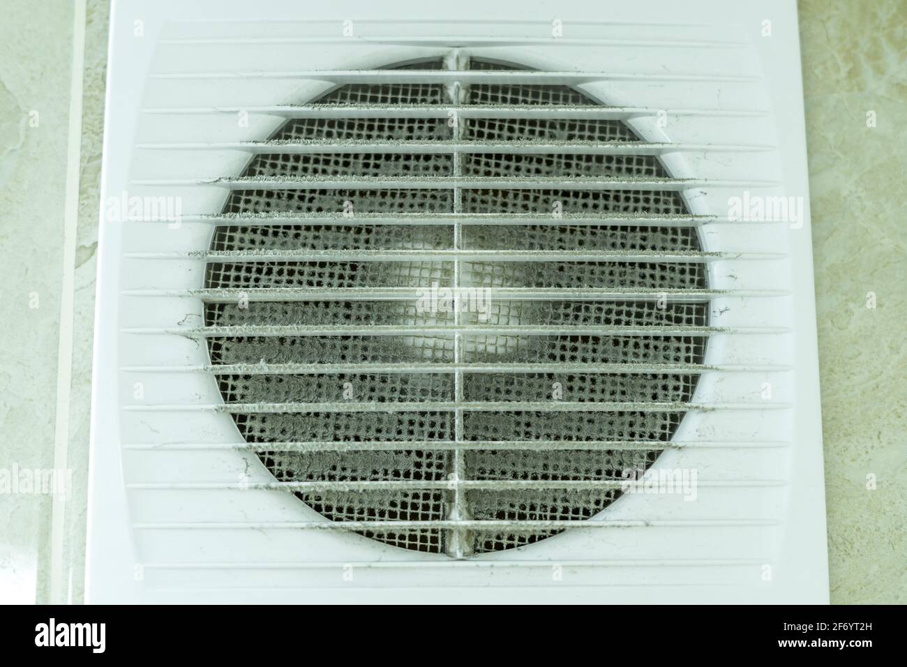 Air extractor clogged with dust in the bathroom Stock Photo - Alamy