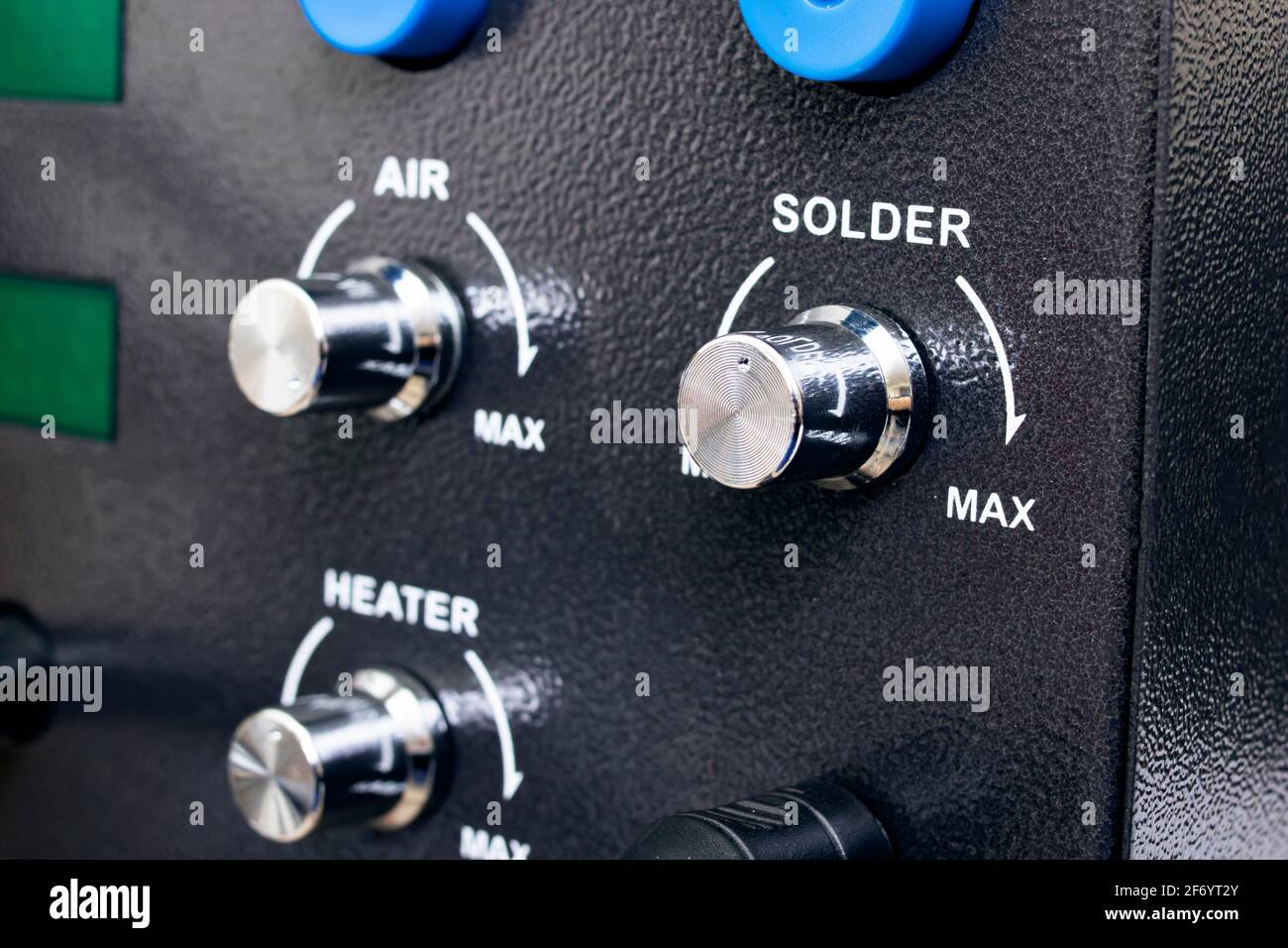Adjustment knobs on the soldering station close up Stock Photo - Alamy