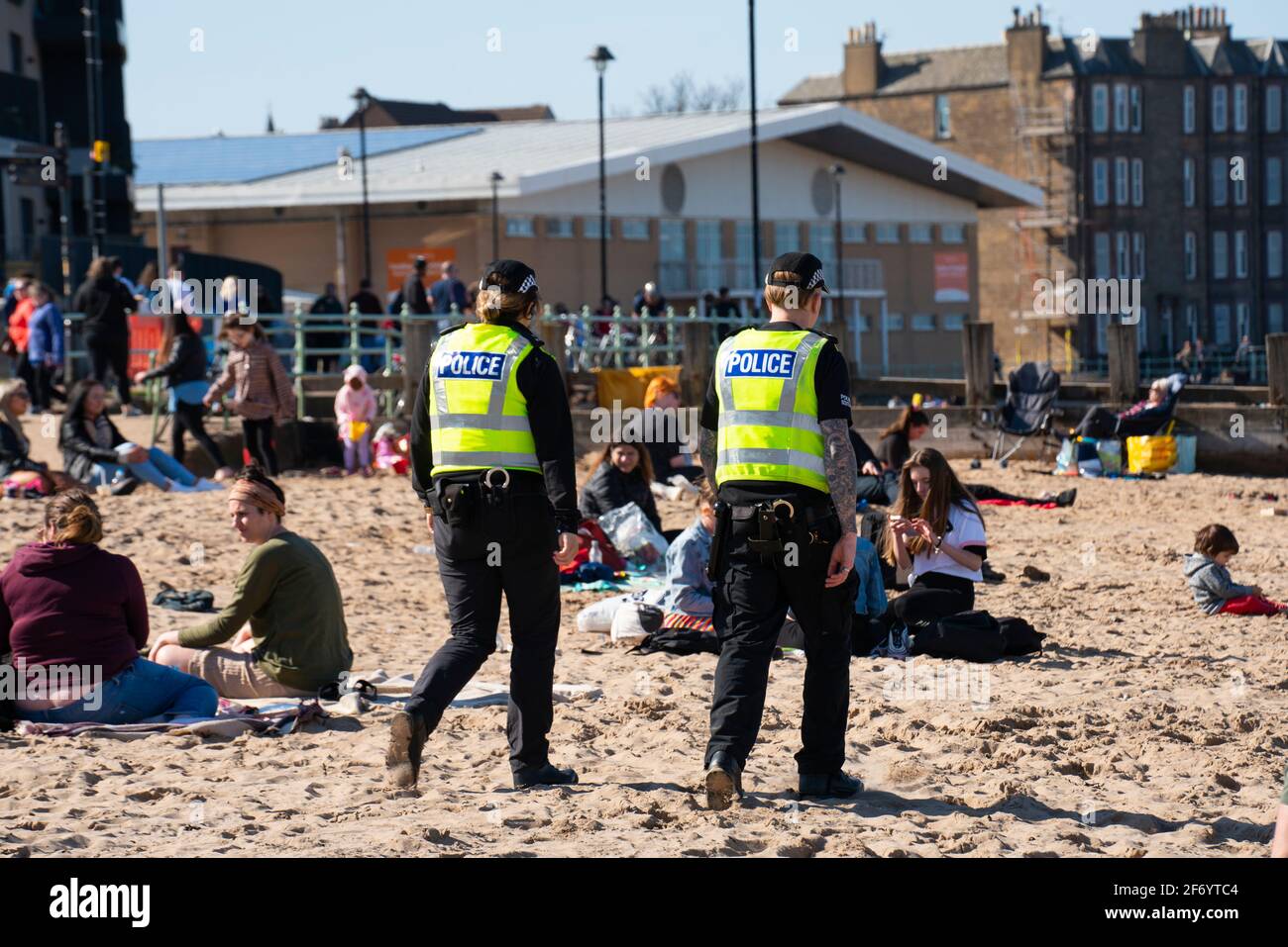 Police patrol along portobello beach promenade hi-res stock photography ...