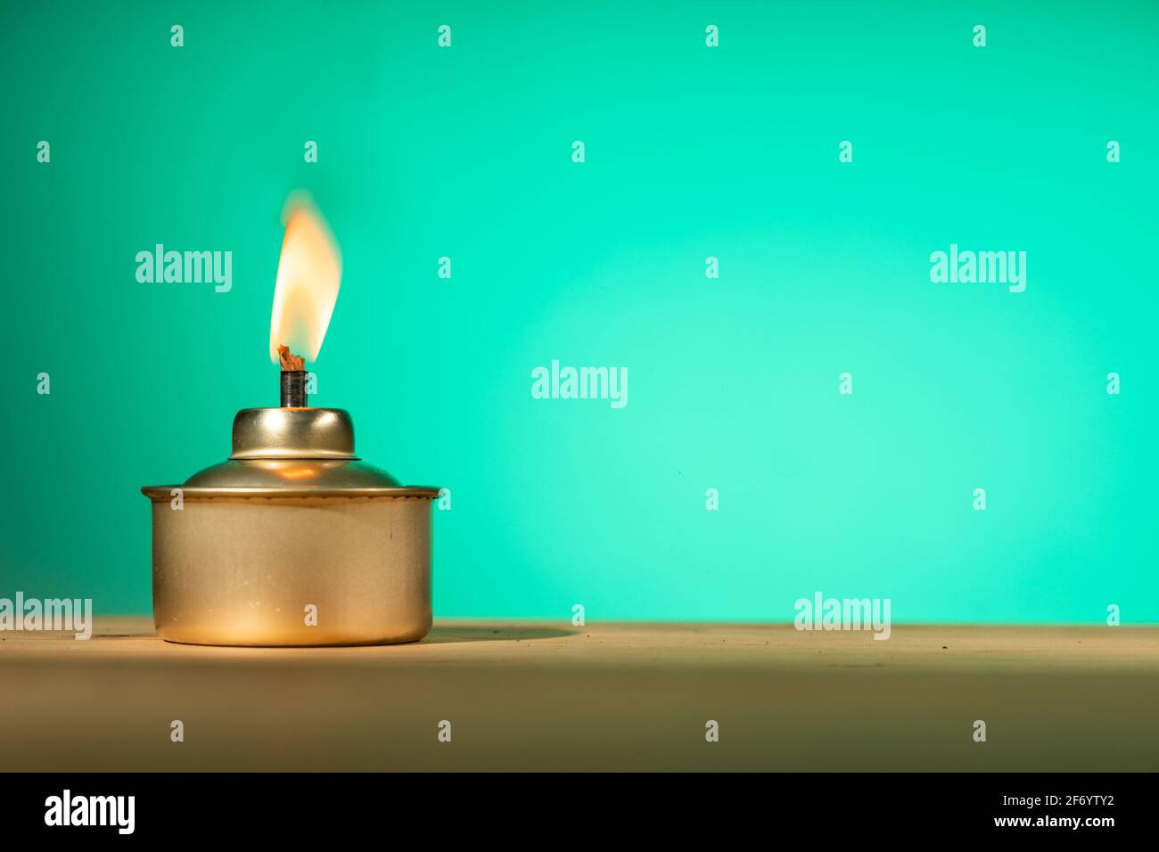 Pelita or oil lamp, traditional Malay oil lamp lit up during Ramadan ...