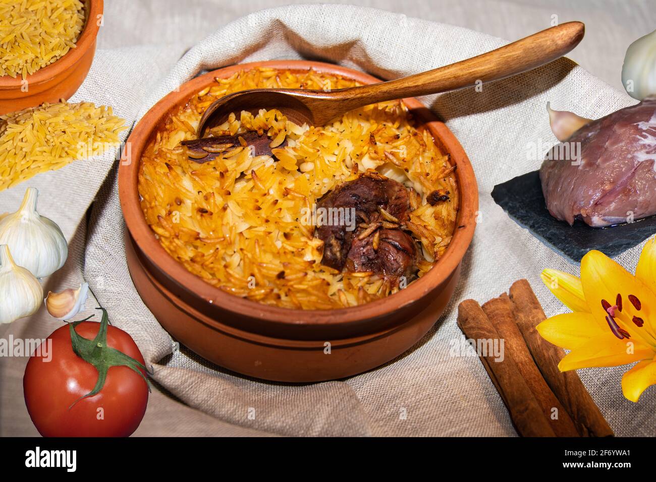 typical mediteranean plate, made with barley, meat, tomatos and garlic ...