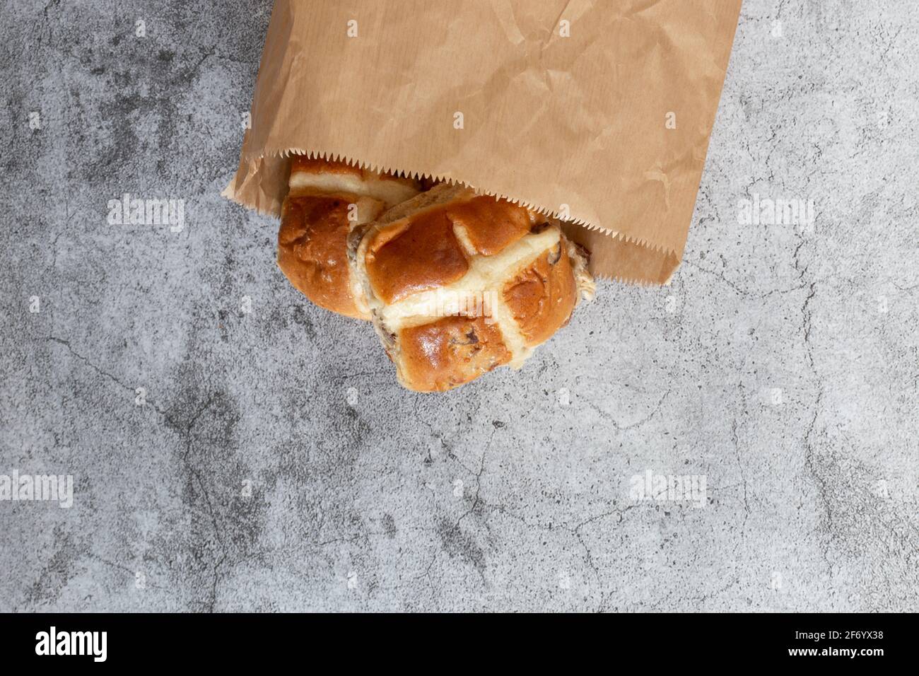 Hot cross buns in a brown paper bag. Recycling environmentally friendly ...