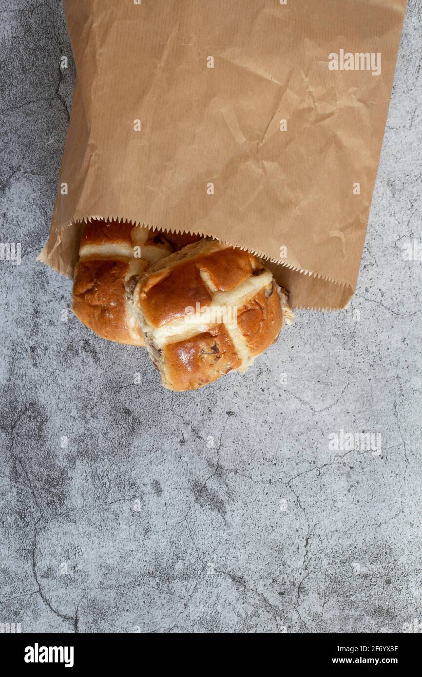 Hot cross buns in a brown paper bag. Recycling environmentally friendly ...