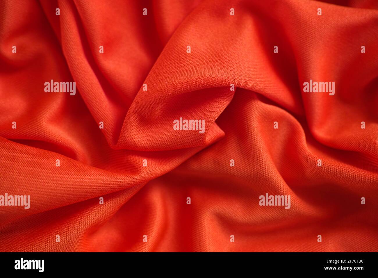 Red crumpled fabric texture background. Close up Stock Photo - Alamy