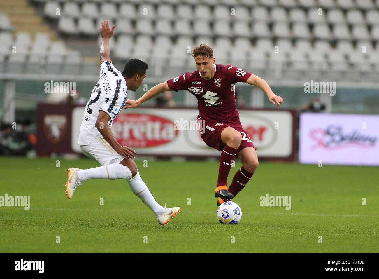 Turin, Italy. 03rd Apr, 2021. Mergim Vojdova (Torino FC) vs Alex Sandro ...