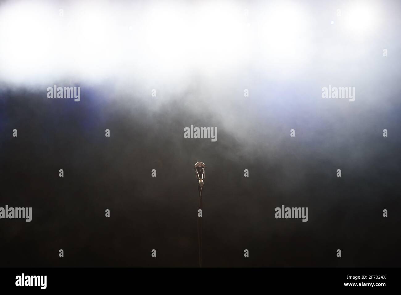 Live music background.Microphone and stage lights. Sing and karaoke ...