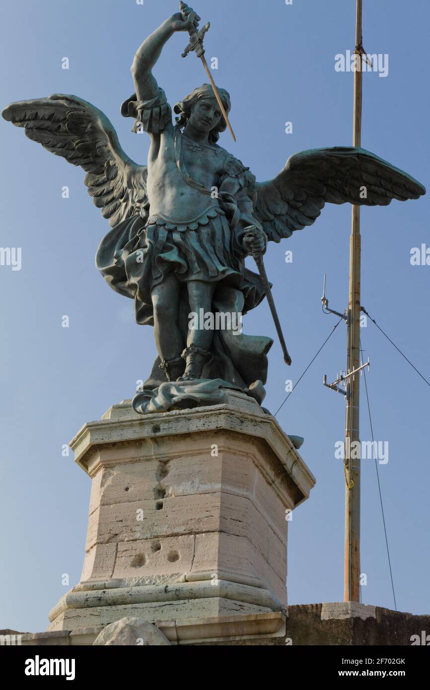 Close-up of Saint Michael sculpture at the top of Sant'Angelo Castle at ...