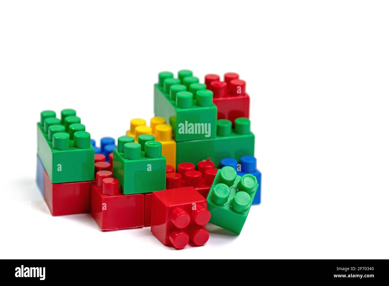 Colorful plastic building blocks against a white background Stock Photo ...