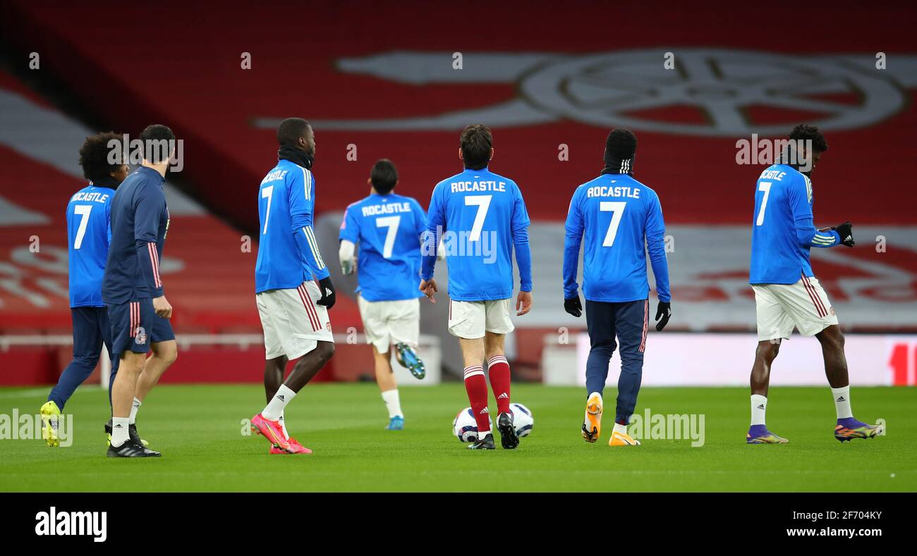 Arsenal players wear shirts to commemorate the 20th anniversary of the ...