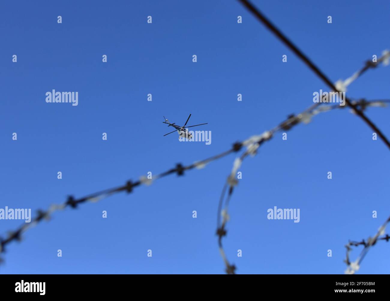 Airport view through barbed wire hi-res stock photography and images ...