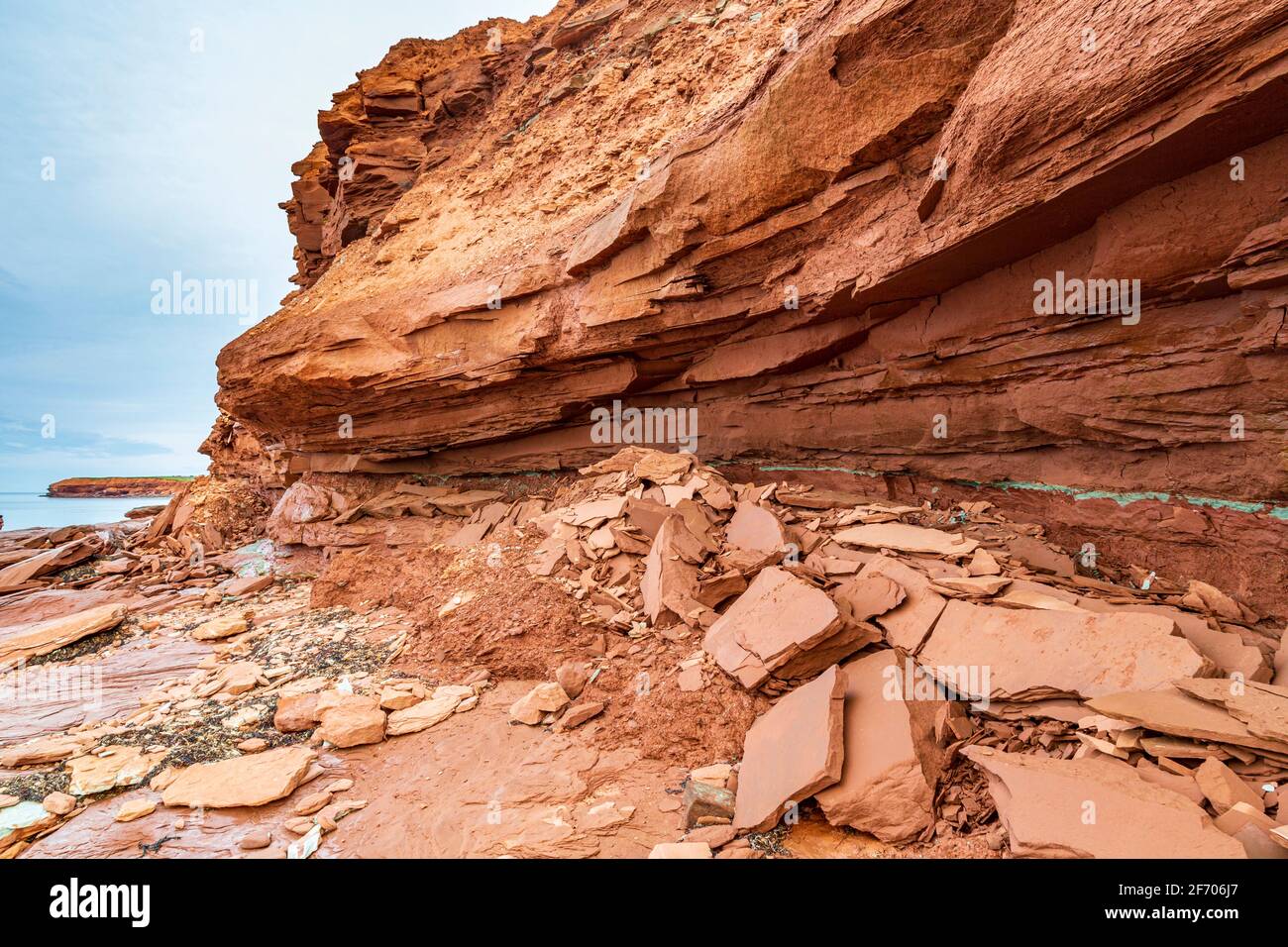 At Cavendish beach, on Canada's Prince Edward Island, the flat red and ...