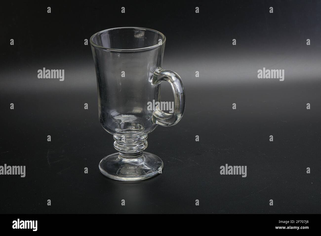 Empty glass cup for drinks isolated Stock Photo - Alamy