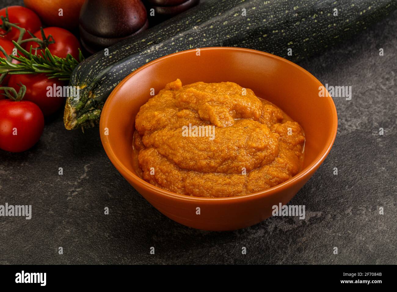 Vegetarian cuisine - Zucchini puree with herbs and spices Stock Photo ...