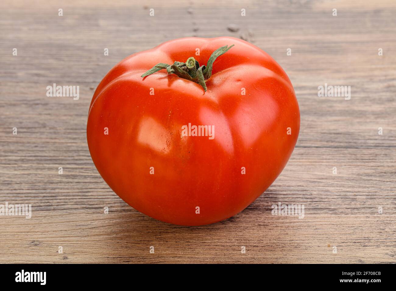 Red ripe big juicy tomato isolated Stock Photo - Alamy