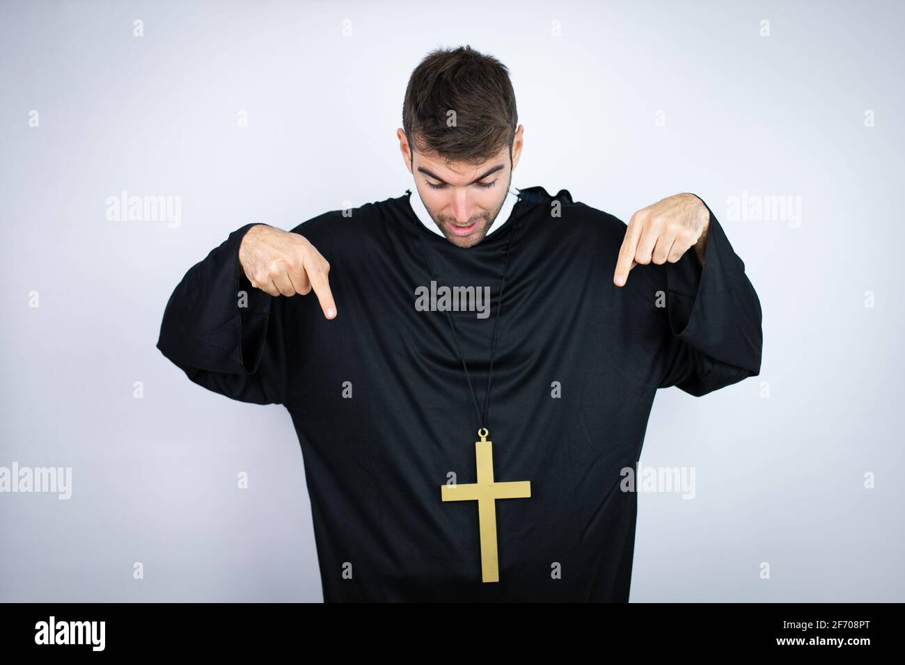 Priest looking up isolated hi-res stock photography and images - Alamy