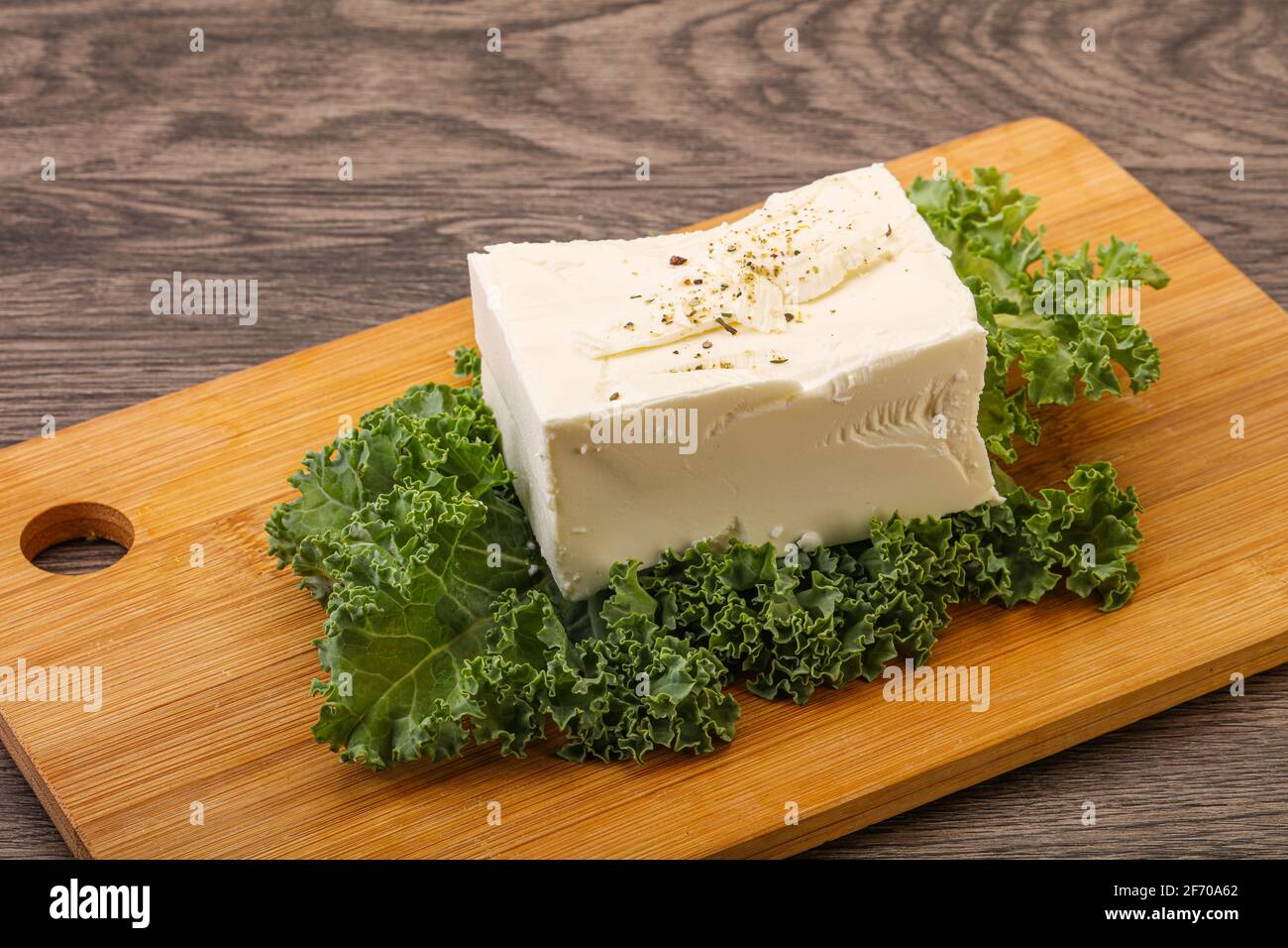 Traditional tasty Greek Feta soft cheese brick Stock Photo - Alamy