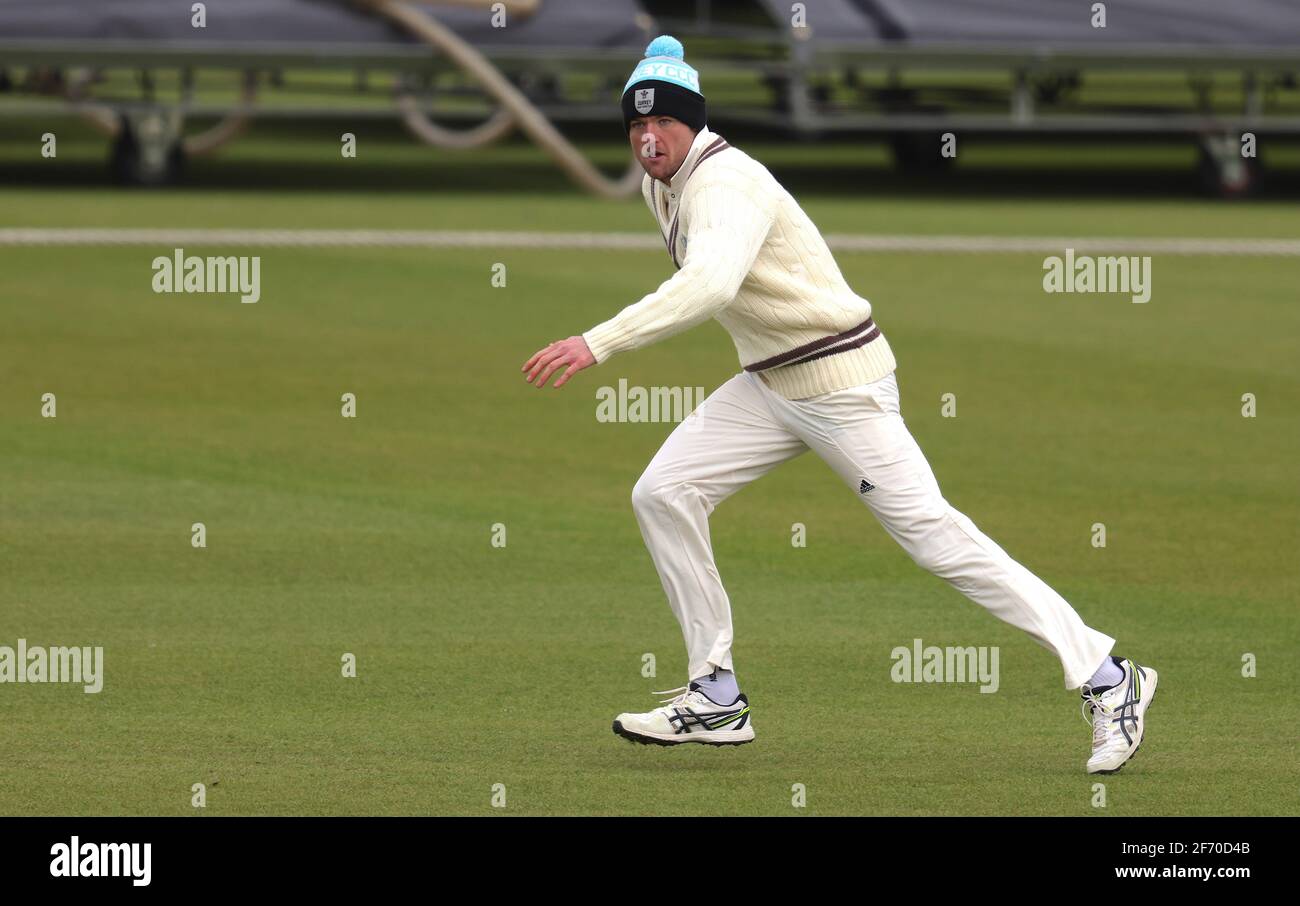 3 April, 2021. London, UK. Daniel Moriarty in the field as Surrey take ...