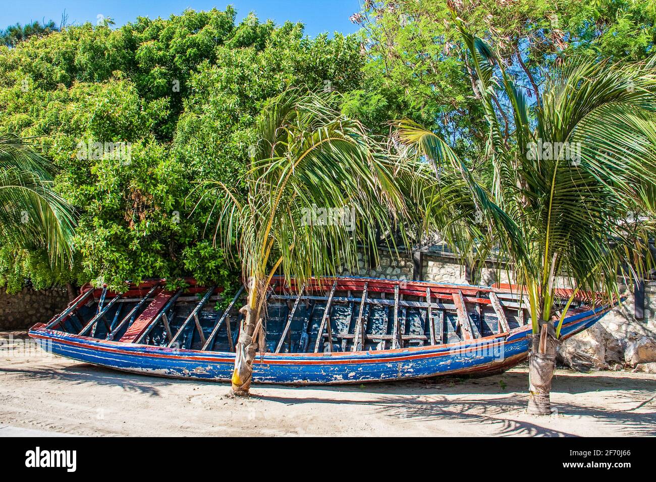 Old Red and Orange Boat on Tropical Beach Stock Photo - Alamy