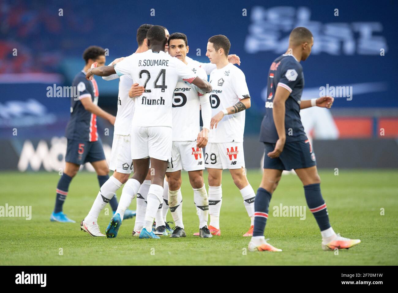 Players of LOSC Lille celebrate their victory and Kylian Mbappe is ...