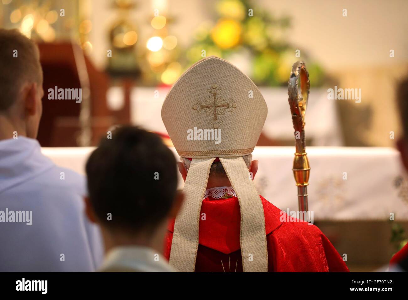 The bishop grants the Sacrament of Confirmation in a large Christian ...