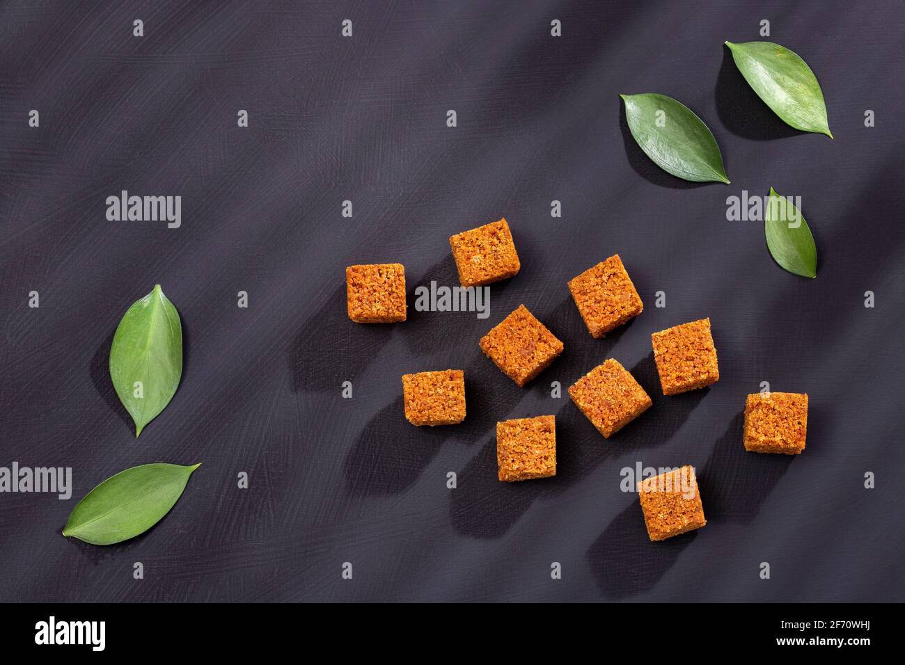 Sugarcane panela cubes - Saccharum officinarum Stock Photo - Alamy