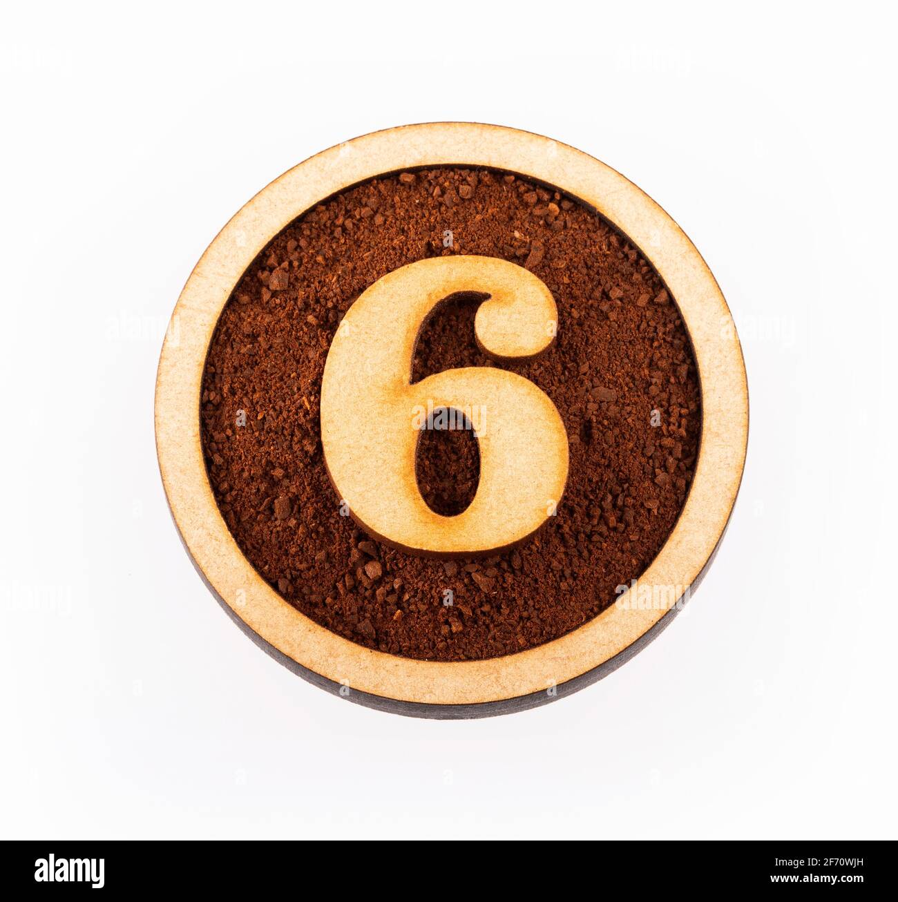 6, Number in wood - Ground organic coffee. Coffea Stock Photo - Alamy