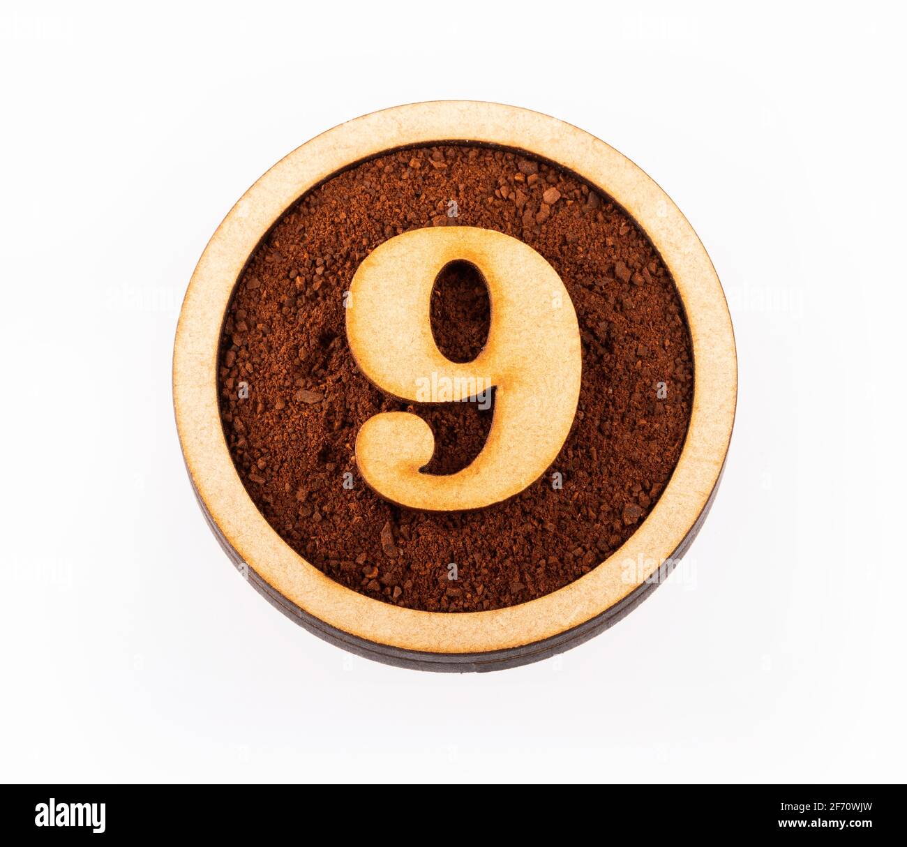 9, Number in wood - Ground organic coffee. Coffea Stock Photo - Alamy