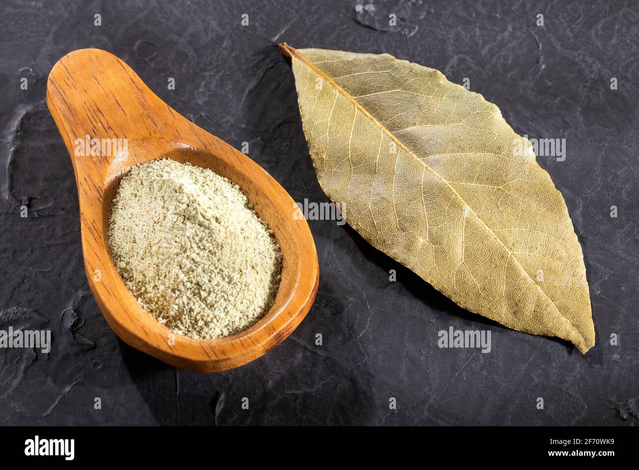 Dried bay leaves and laurel powder - Laurus nobilis. Text space Stock ...