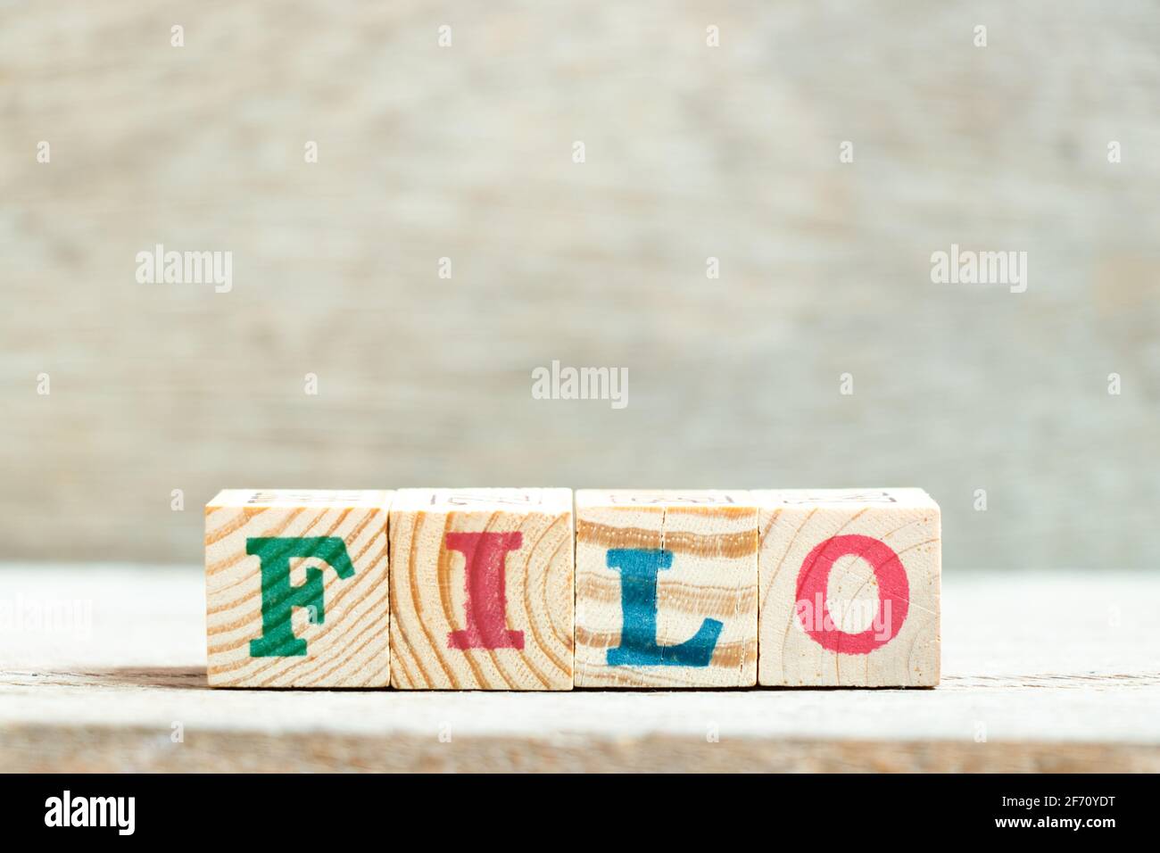 Alphabet letter block in word FILO (abbreviation of first in last out ...