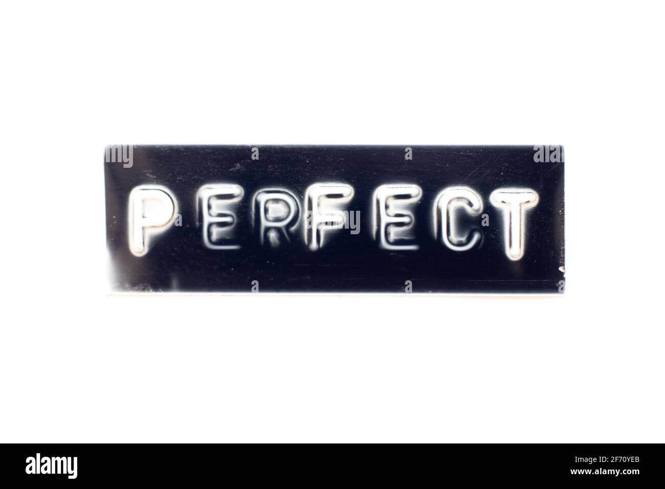 Embossed letter in word perfect on black banner with white background ...