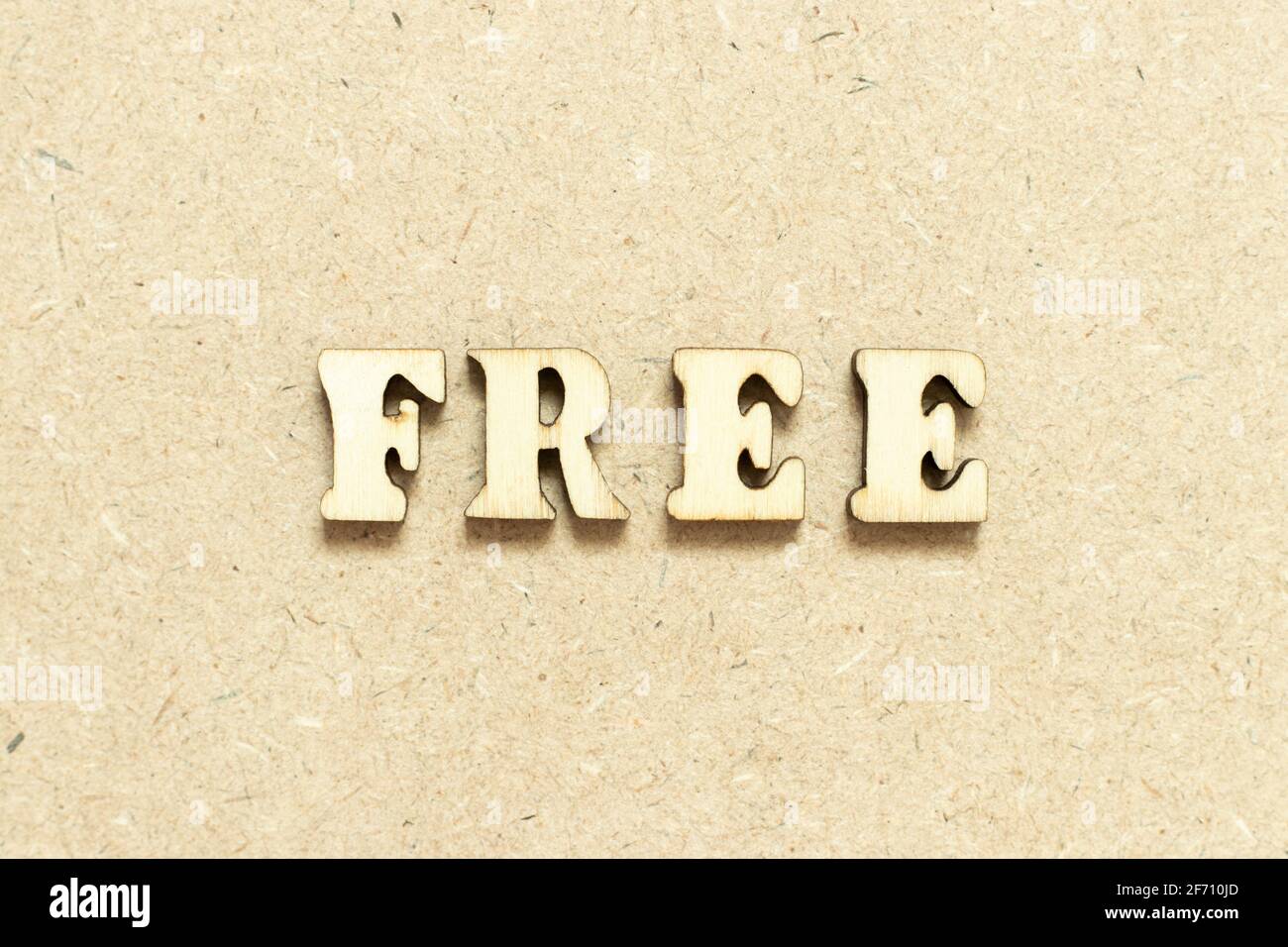 Alphabet letter in word free on wood background Stock Photo - Alamy
