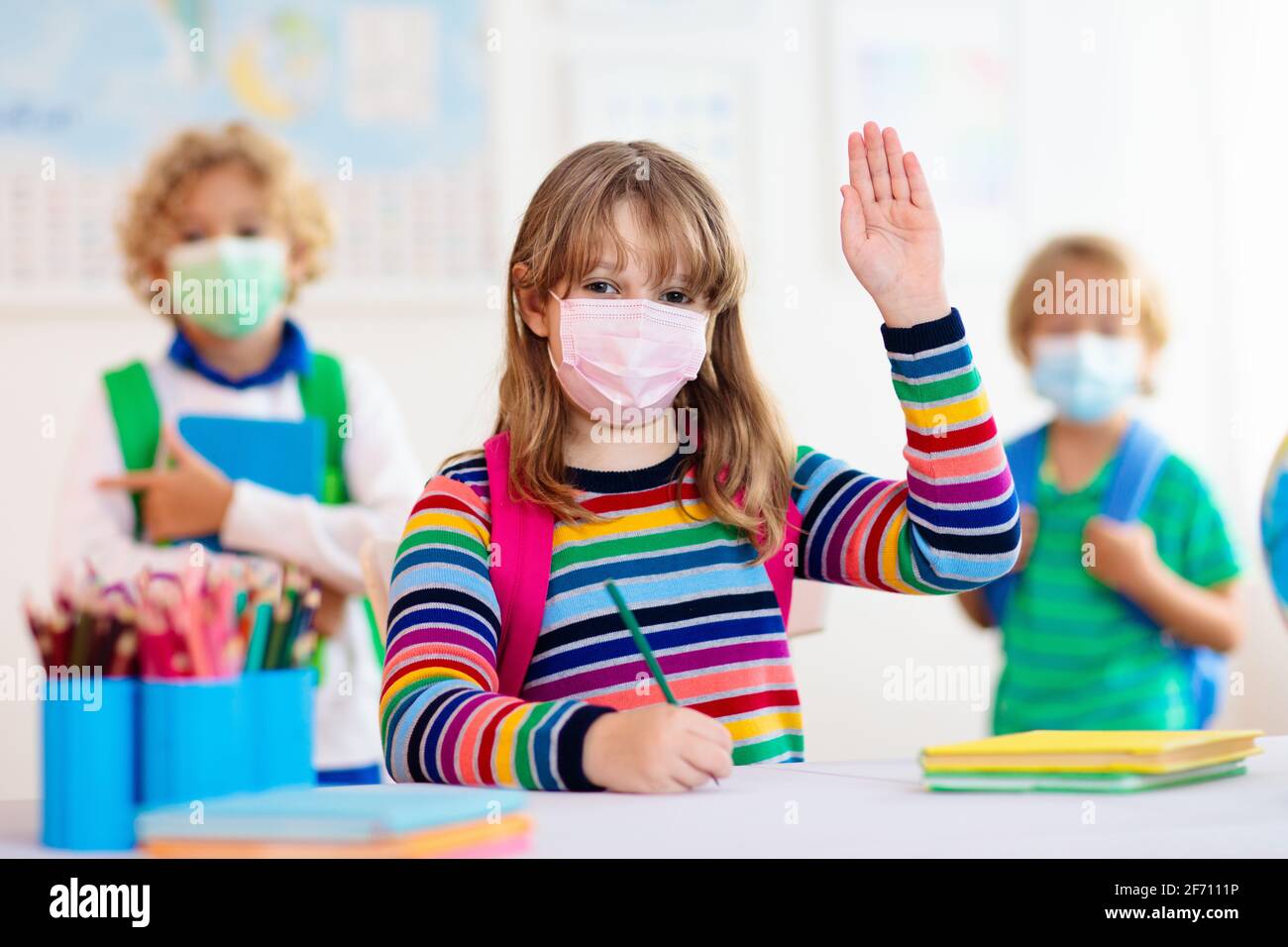School child wearing face mask during corona virus and flu outbreak ...