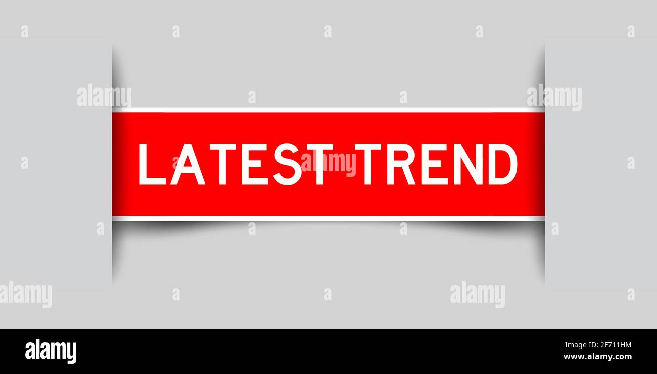 Inserted red color label sticker with word latest trend on gray ...