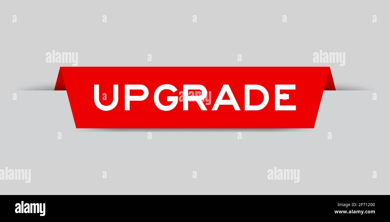 Red color inserted label with word upgrade on gray background Stock ...