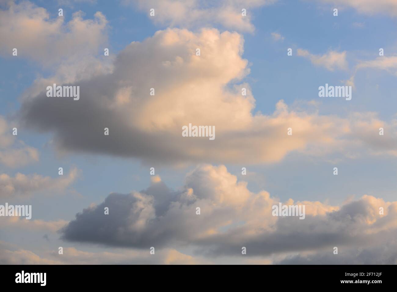 Beautiful fluffy clouds sit hi-res stock photography and images - Alamy