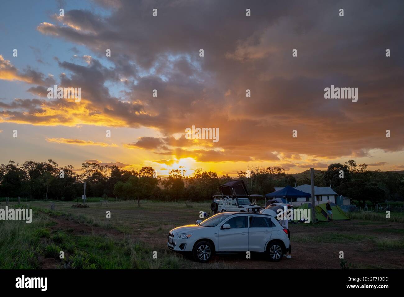 Camping at Sunset Stock Photo - Alamy