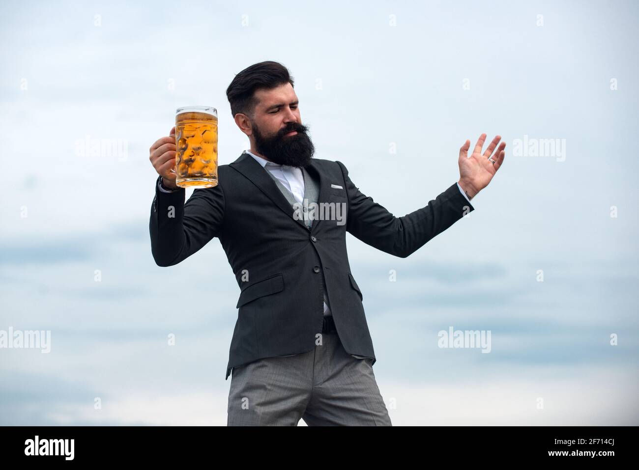 Excited drunk man with glass of beer. Degustation and tasting Stock ...