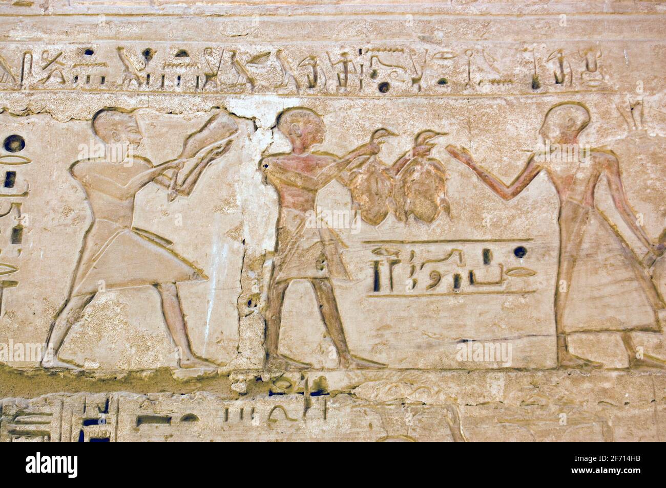 Two ducks or geese being offered to the gods. Ancient Egyptian carving ...