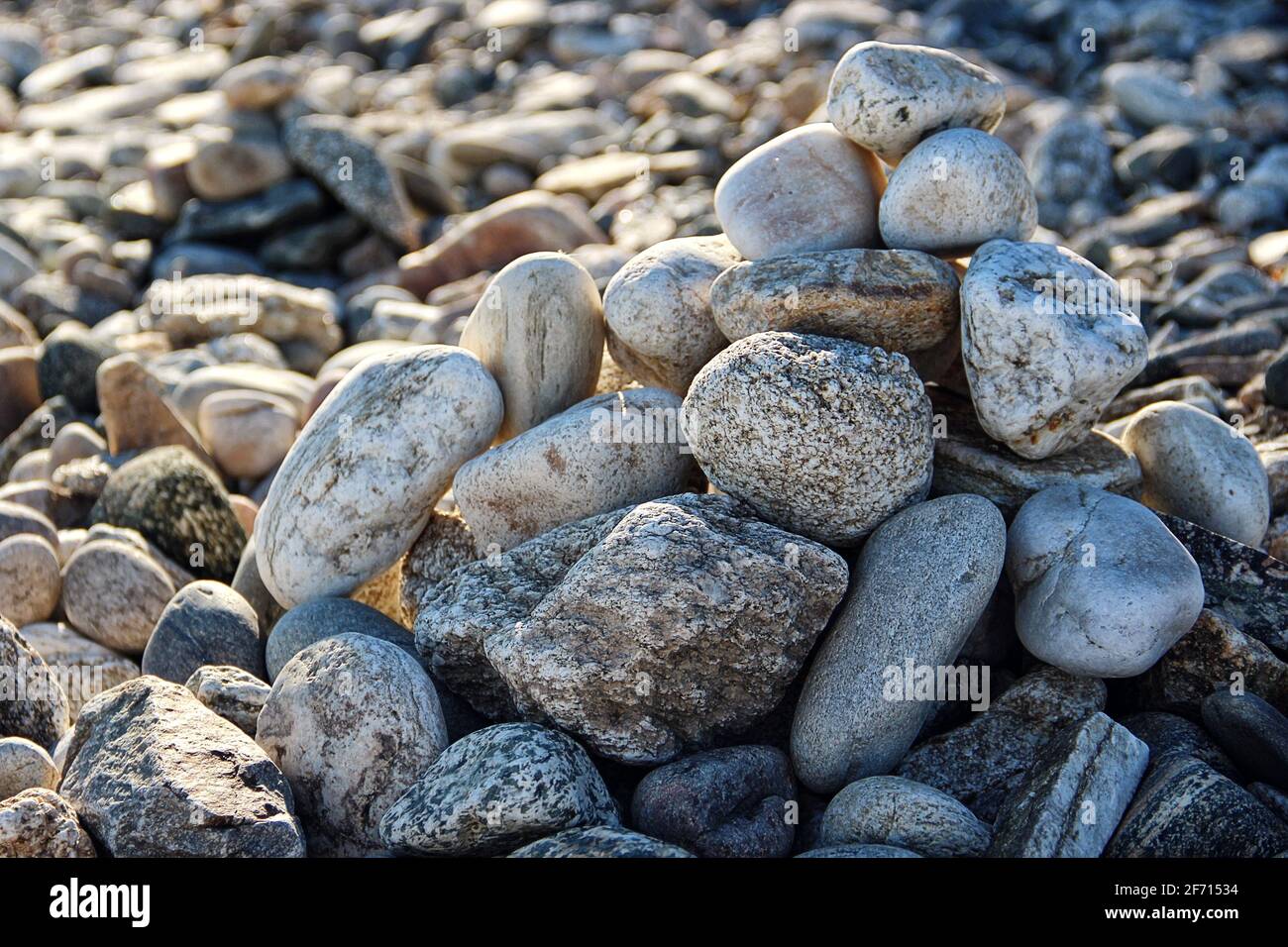 Pebble stacked on large stone hi-res stock photography and images - Alamy