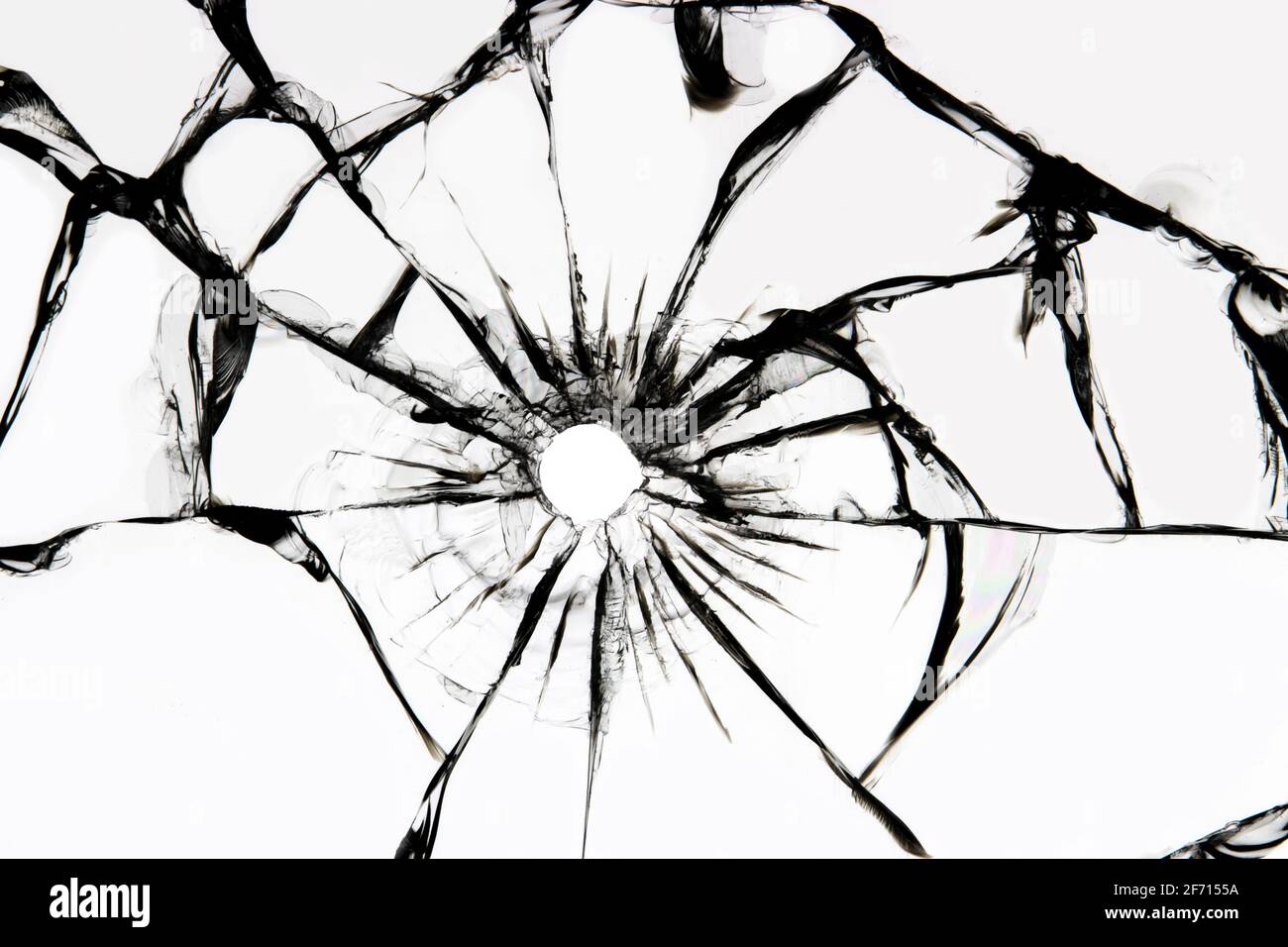 Damaged glass with cracks, cracks in the glass from the shot. Broken ...