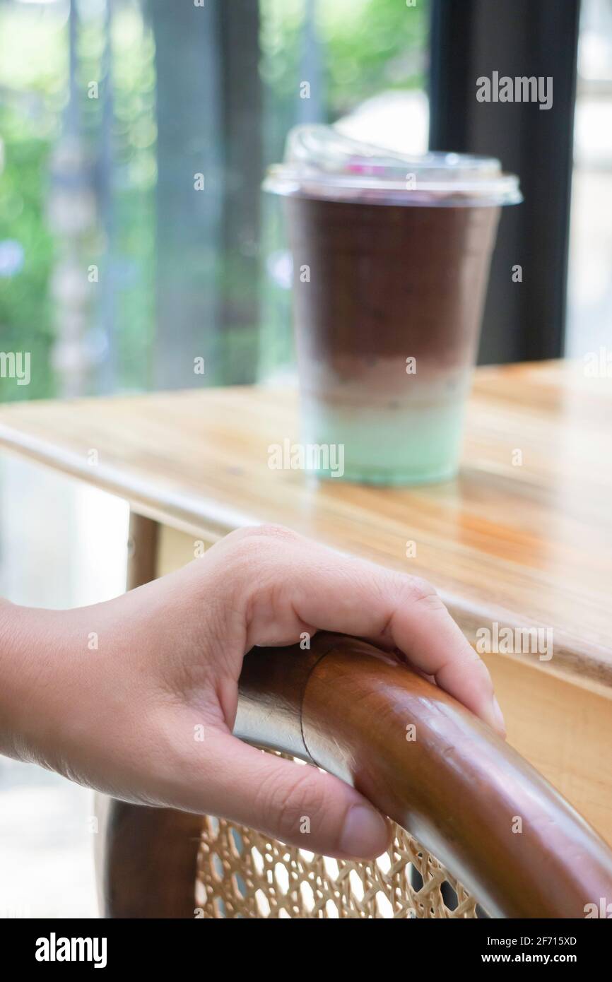 Woman hand hold on chair, stock photo Stock Photo - Alamy