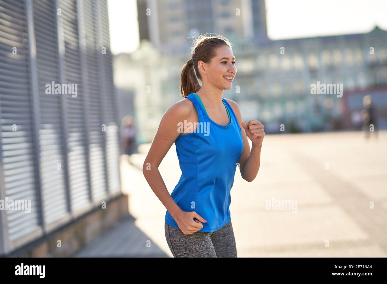 Pretty woman jogging hi-res stock photography and images - Alamy