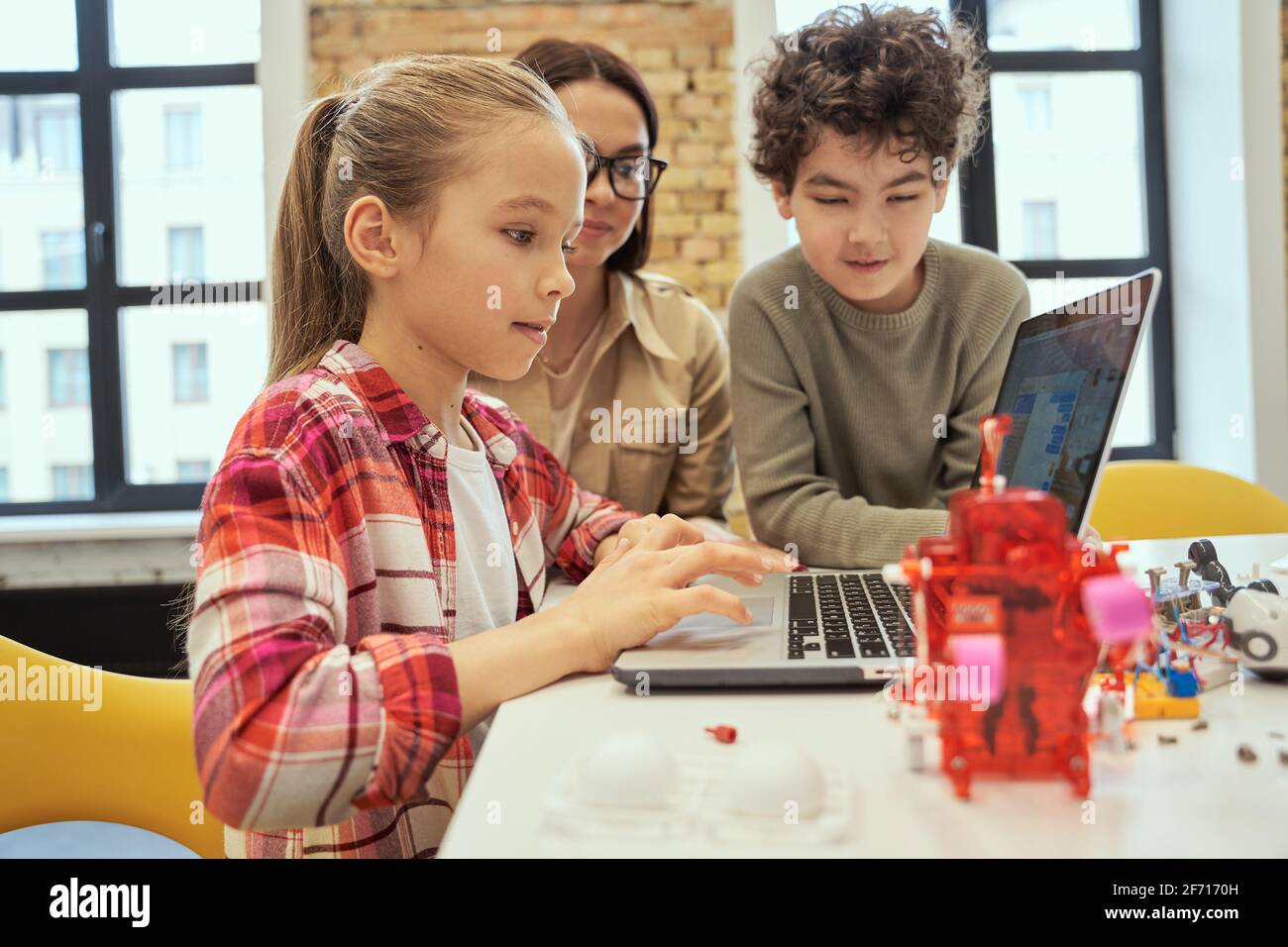 Understand how technology works. Cute little girl learn programming ...