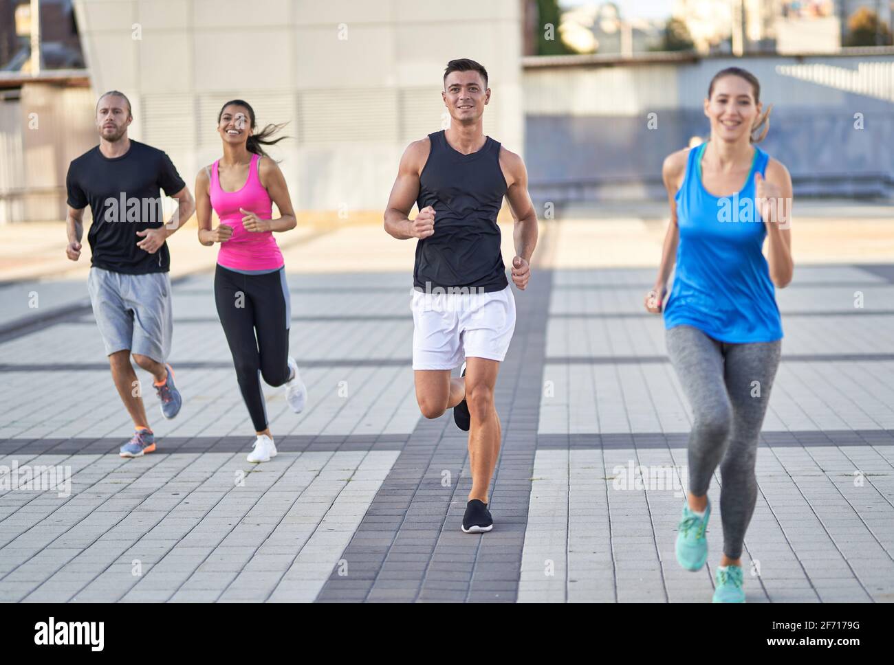 Male female runners together hi-res stock photography and images - Alamy