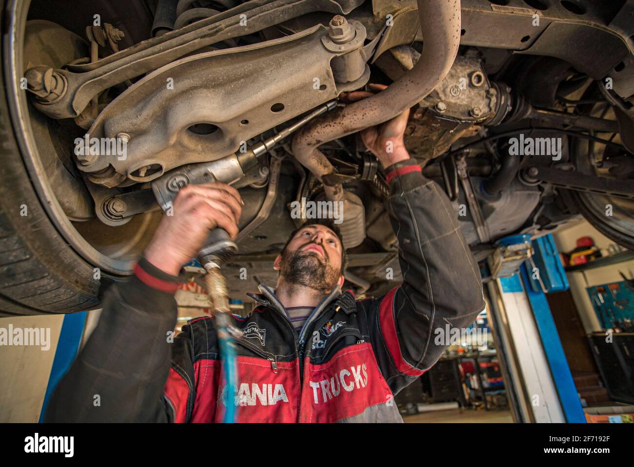 MILAN, ITALY 28 MARCH 2021: Mechanic repairs the car Stock Photo - Alamy