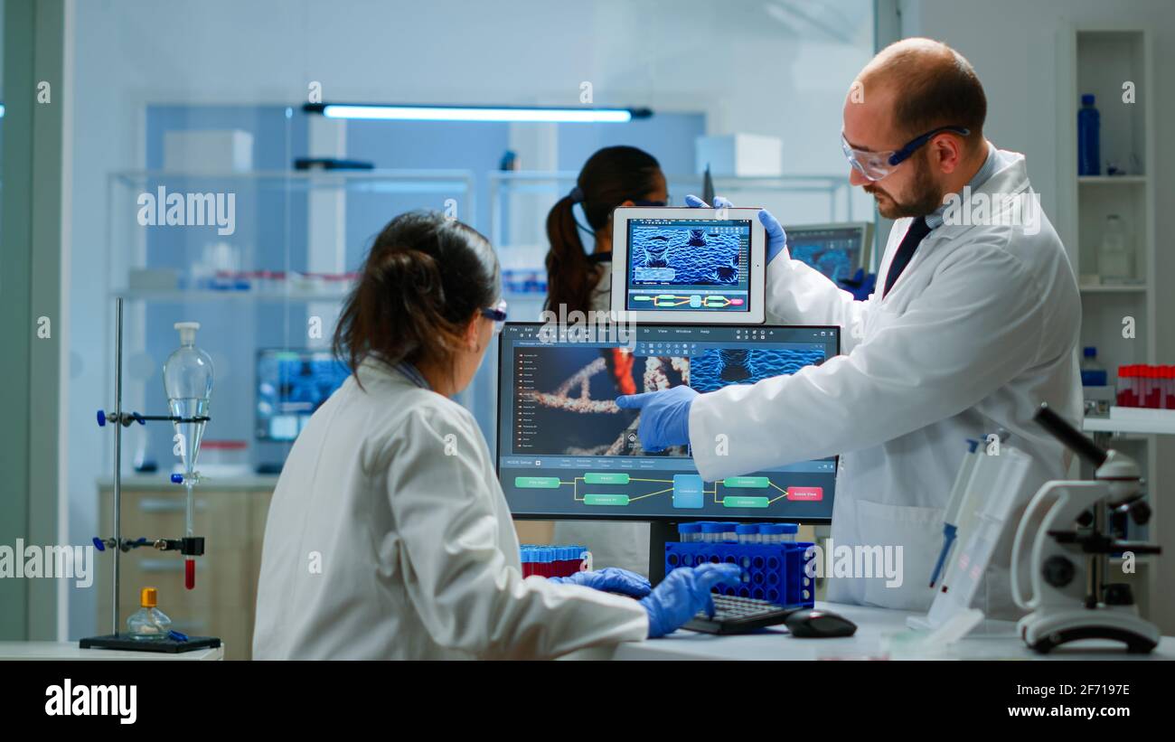 Team chemists worried virus evolution hi-res stock photography and ...