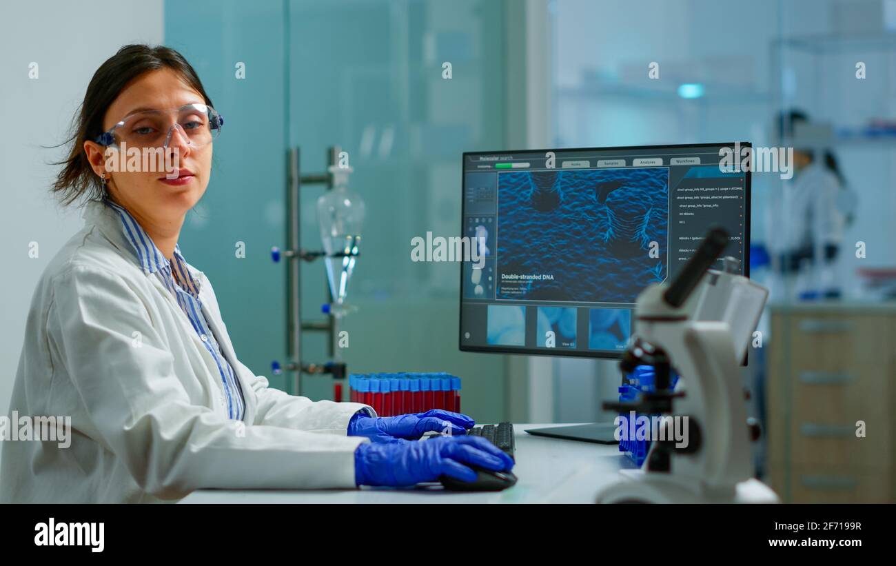Portrait tired scientist trying smile hi-res stock photography and ...