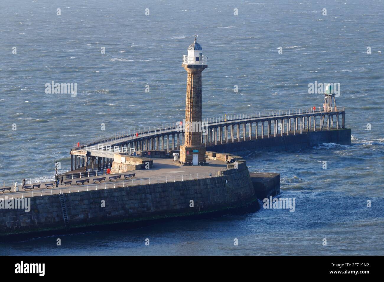 The West Pier & lighthouse in Whitby,North Yorkshire,UK Stock Photo - Alamy