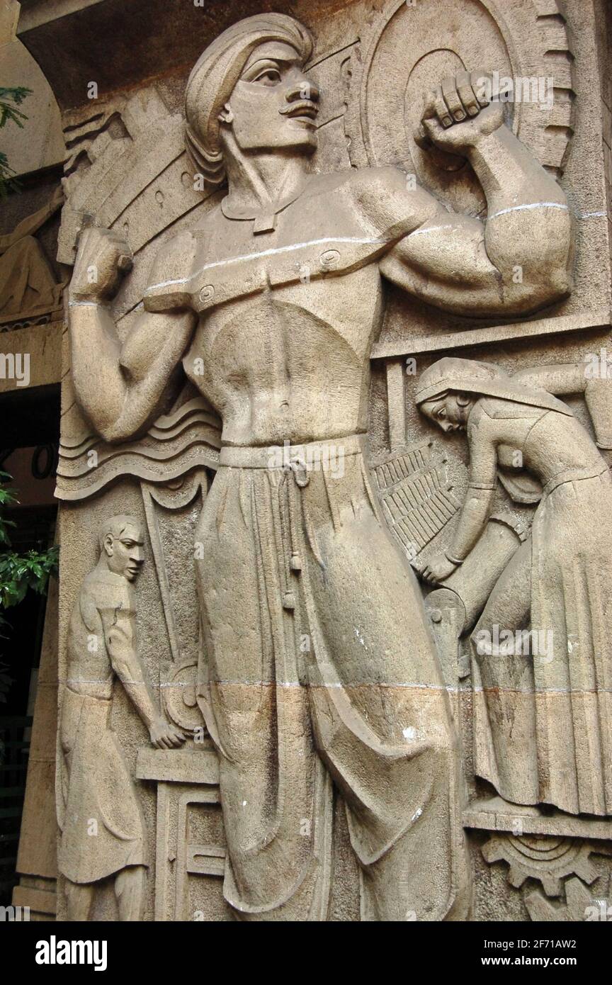 An art deco stone carving depicting Industry on the street facing wall ...